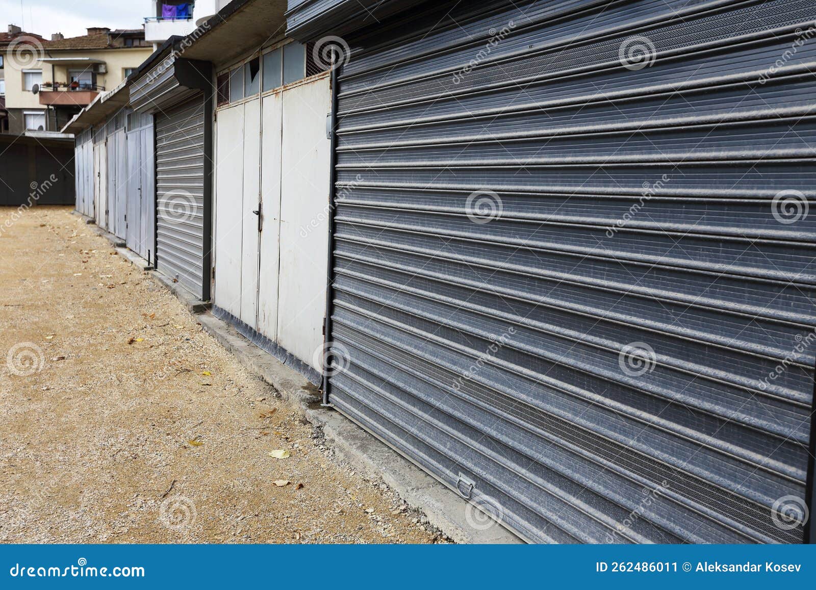 Row garage doors stock image. Image of door, industrial - 262486011