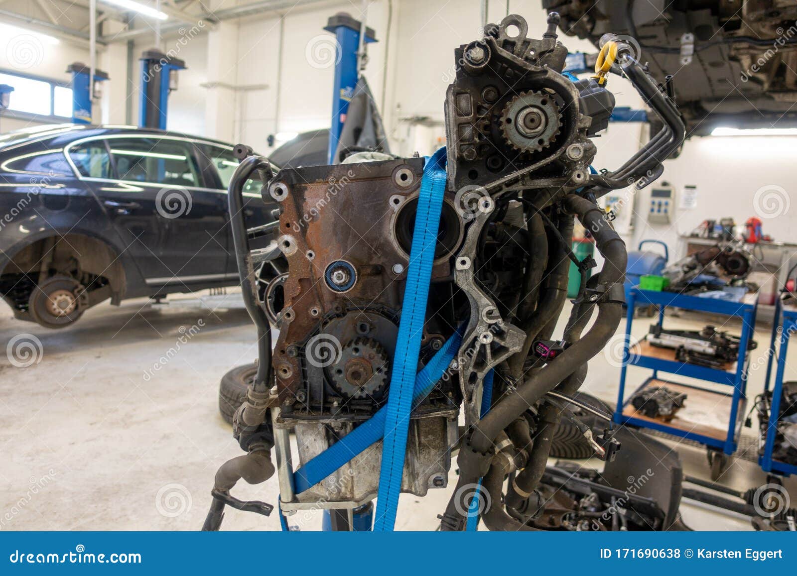A Garage the Engine of a Car Was Removed To Be Repaired Stock Photo ...