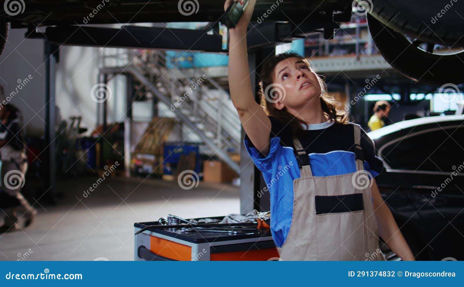 Garage Engineer Working on Suspended Car Stock Footage - Video of ...