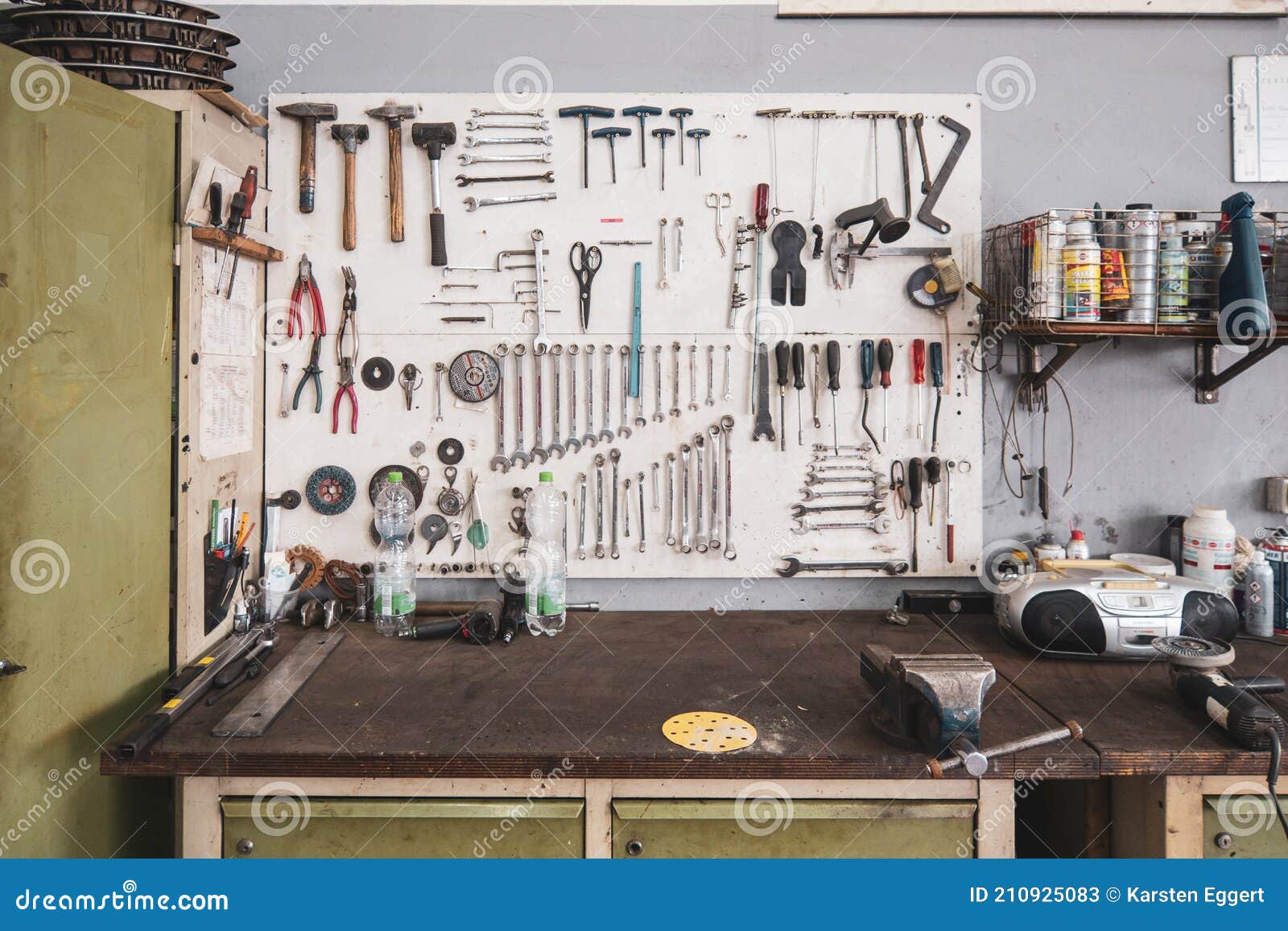 In Garage There are Many Tools Hanging on the Wall Stock Image - Image ...