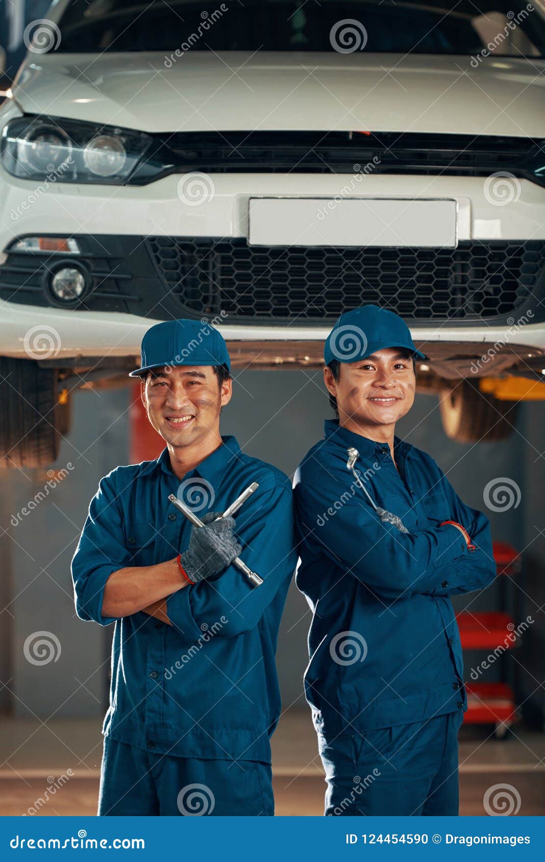 Garage workers stock photo. Image of transportation - 124454590