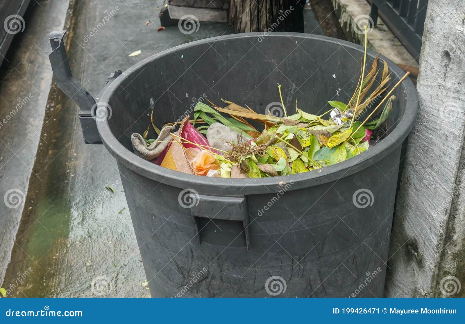 Garbage in Big Black Plastic Trash Bin Stock Image - Image of litter ...