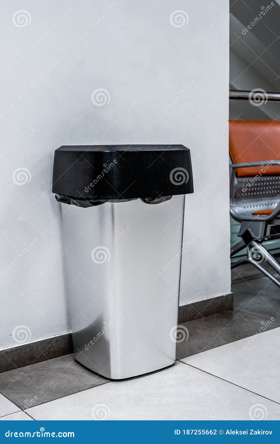 Garbage Bin on the Floor in a Room. Garbage Can in Restroom with Black ...