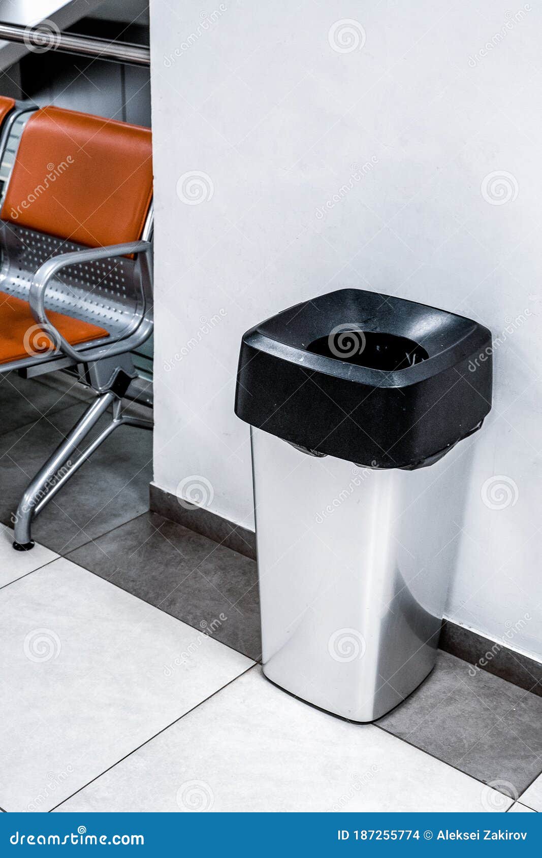Garbage Bin on the Floor in a Room. Garbage Can in Restroom with Black ...