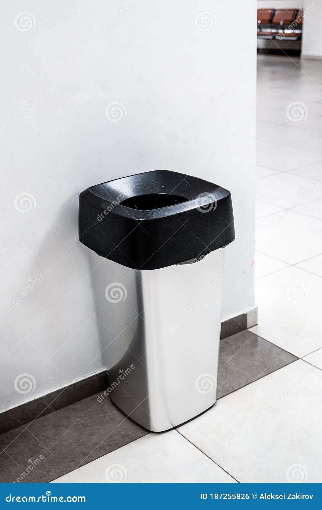 Garbage Bin on the Floor in a Room. Garbage Can in Restroom with Black ...