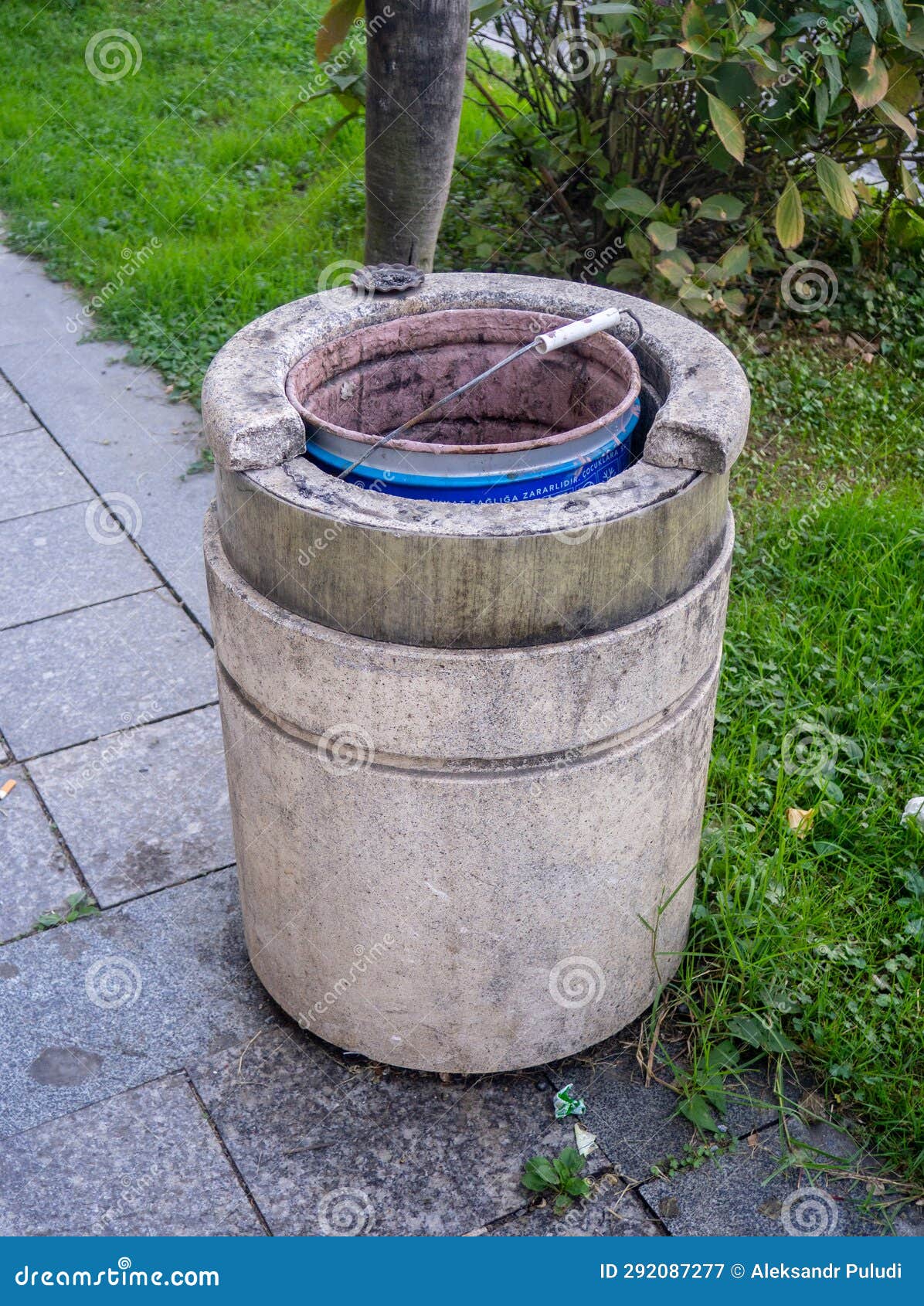 Garbage Bin in the Park. an Iron Bucket in a Concrete Urn Stock Image ...