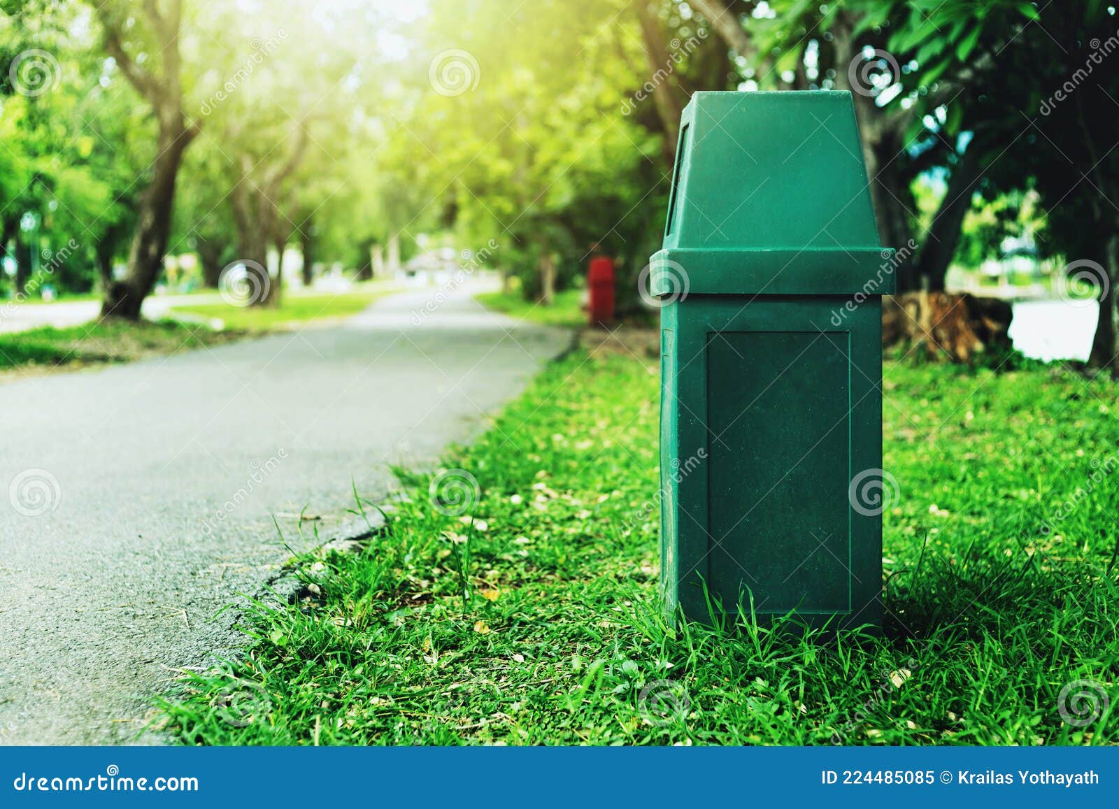 Garbage Bin on the Roadside in the Park Stock Image - Image of cleaning ...