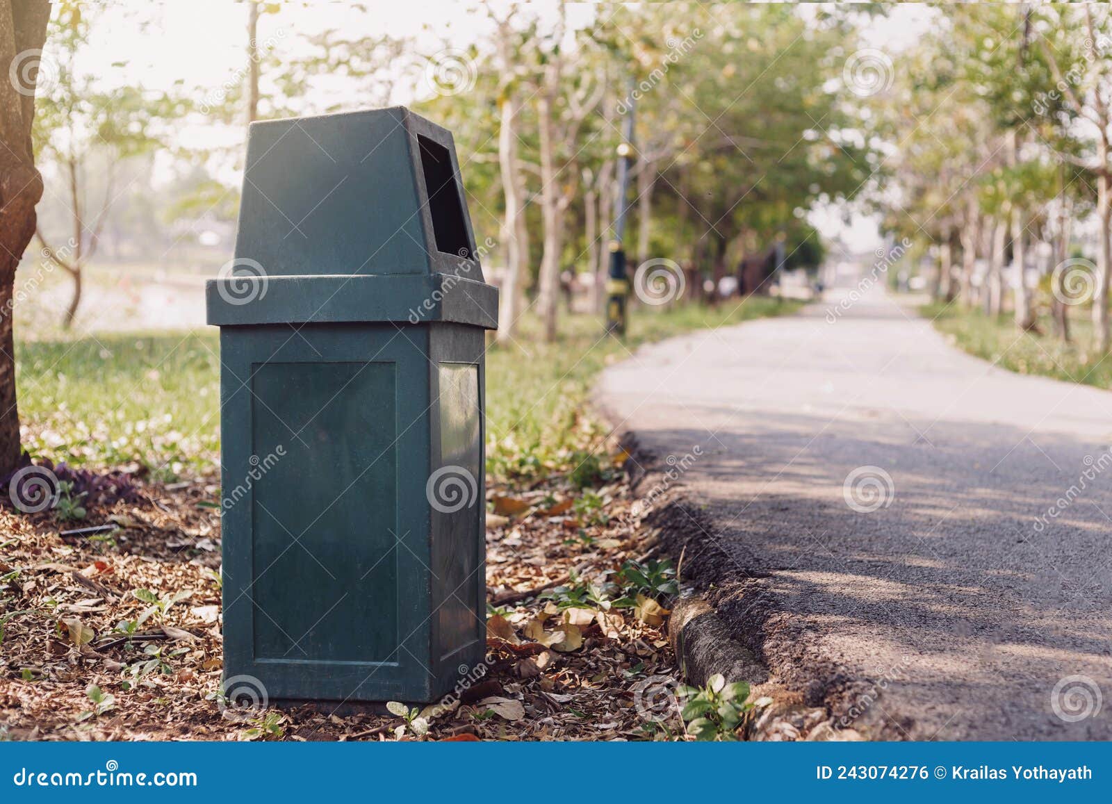 Garbage Bin on the Roadside in the Park Stock Photo - Image of trash ...