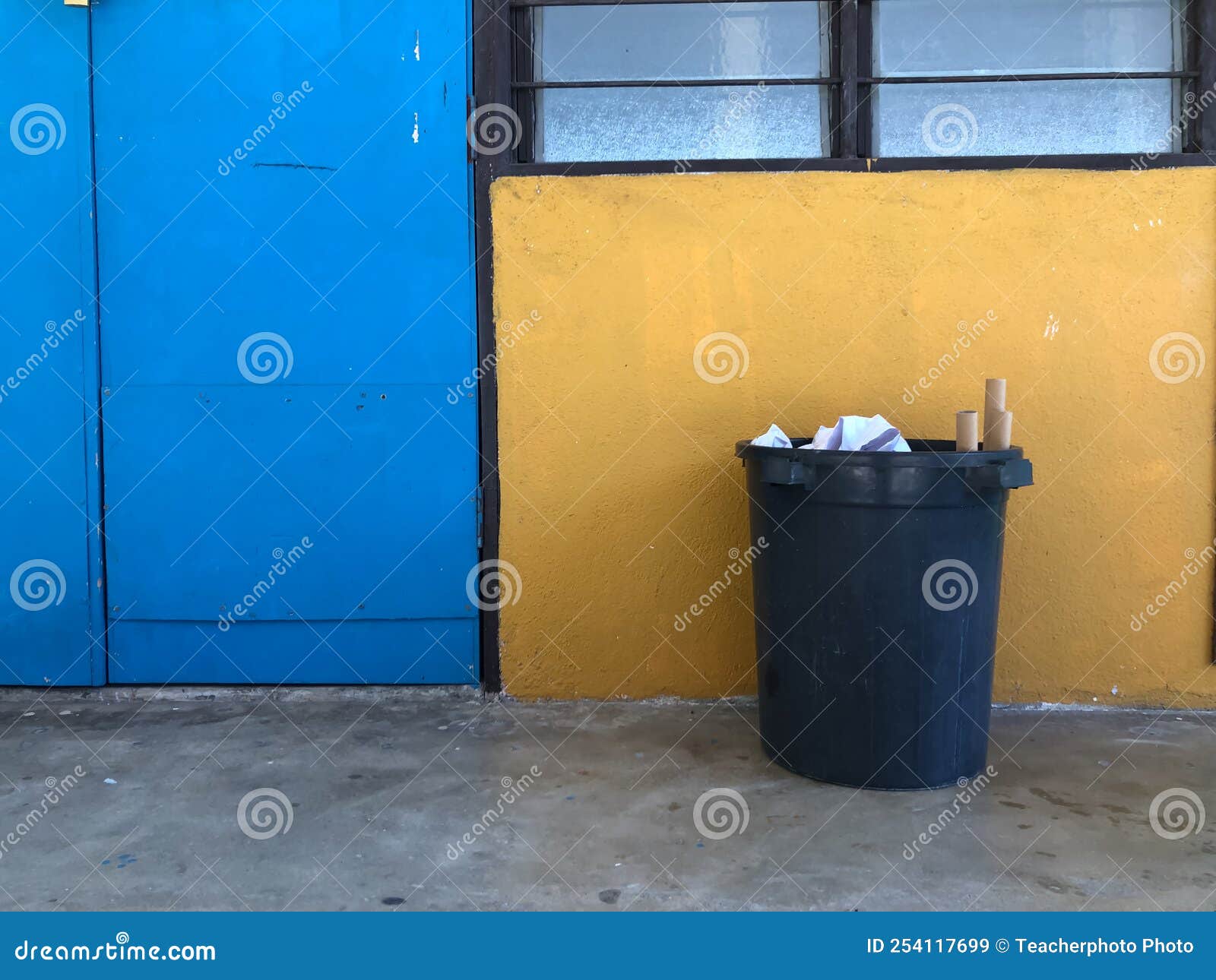 Garbage Bin with Trashes at the Class Corridor Stock Image - Image of ...
