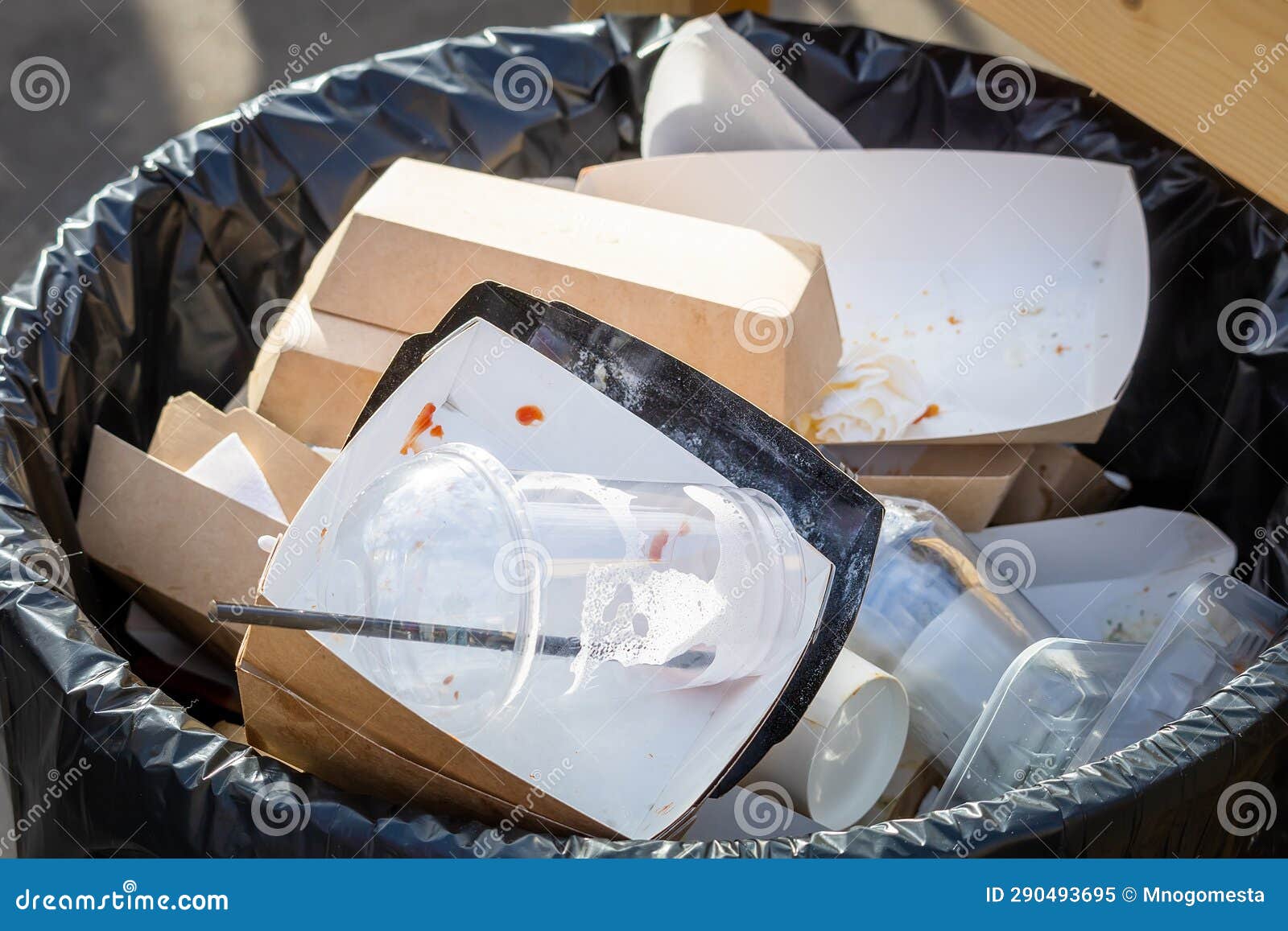 Garbage Bin with Unsorted Recyclable Waste. Cardboard Boxes, Paper ...