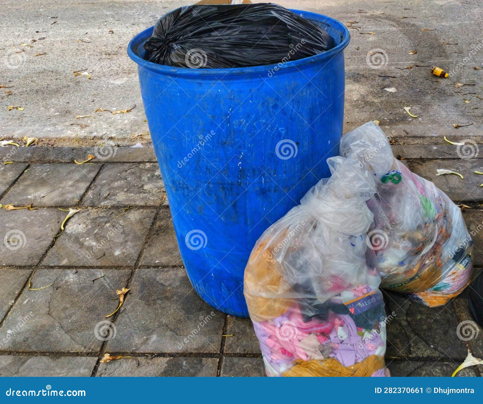 Plastic Bags and Garbage, Garbage Bins Full of Trash in the Public Area ...