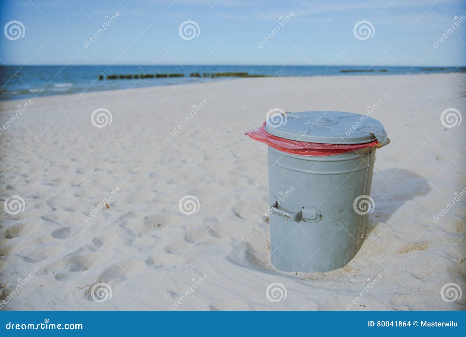 Garbage can at the beach stock photo. Image of paper - 80041864