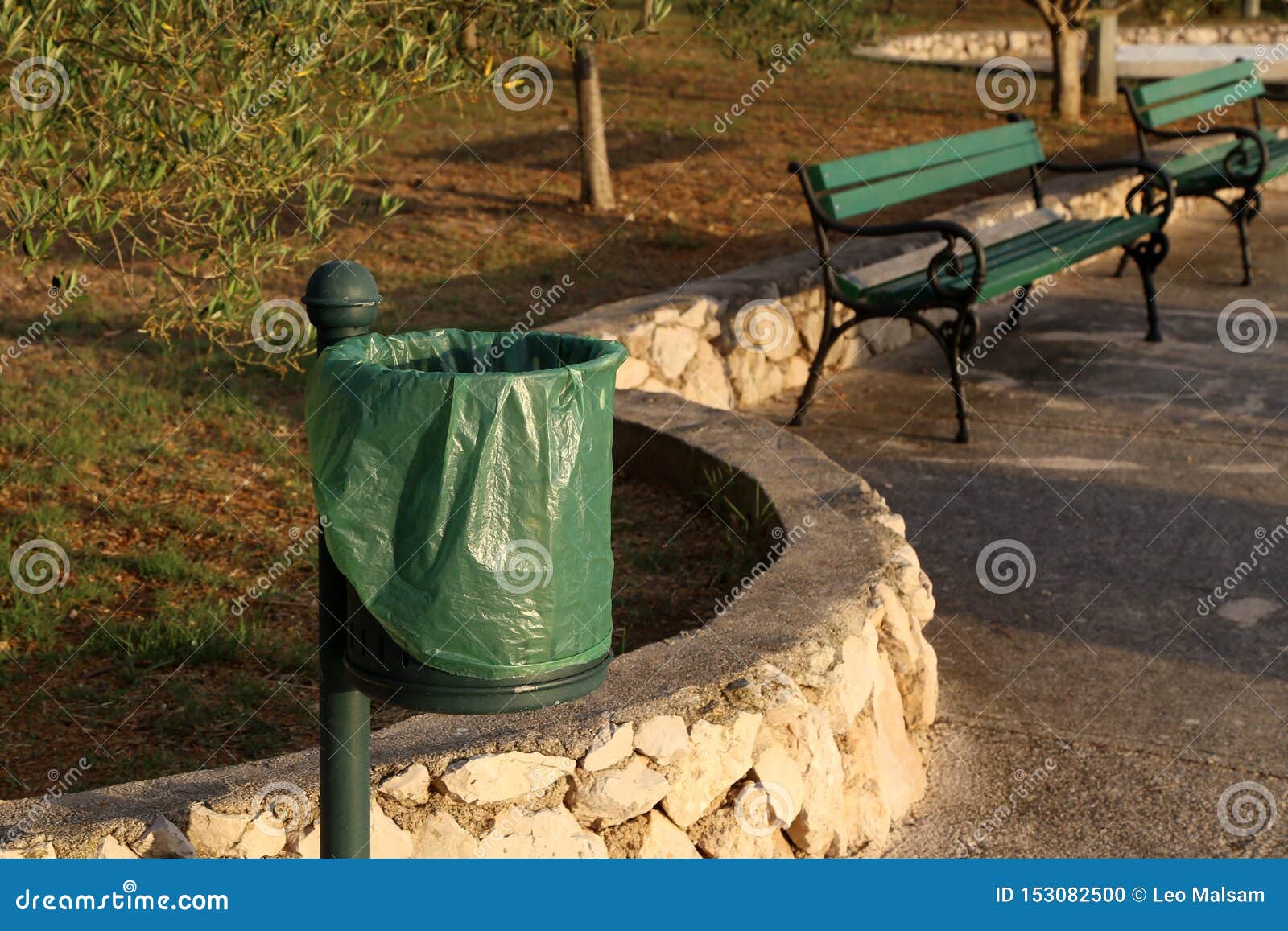 Garbage Can. Empty Trash Can in a City Park Stock Photo - Image of blue ...