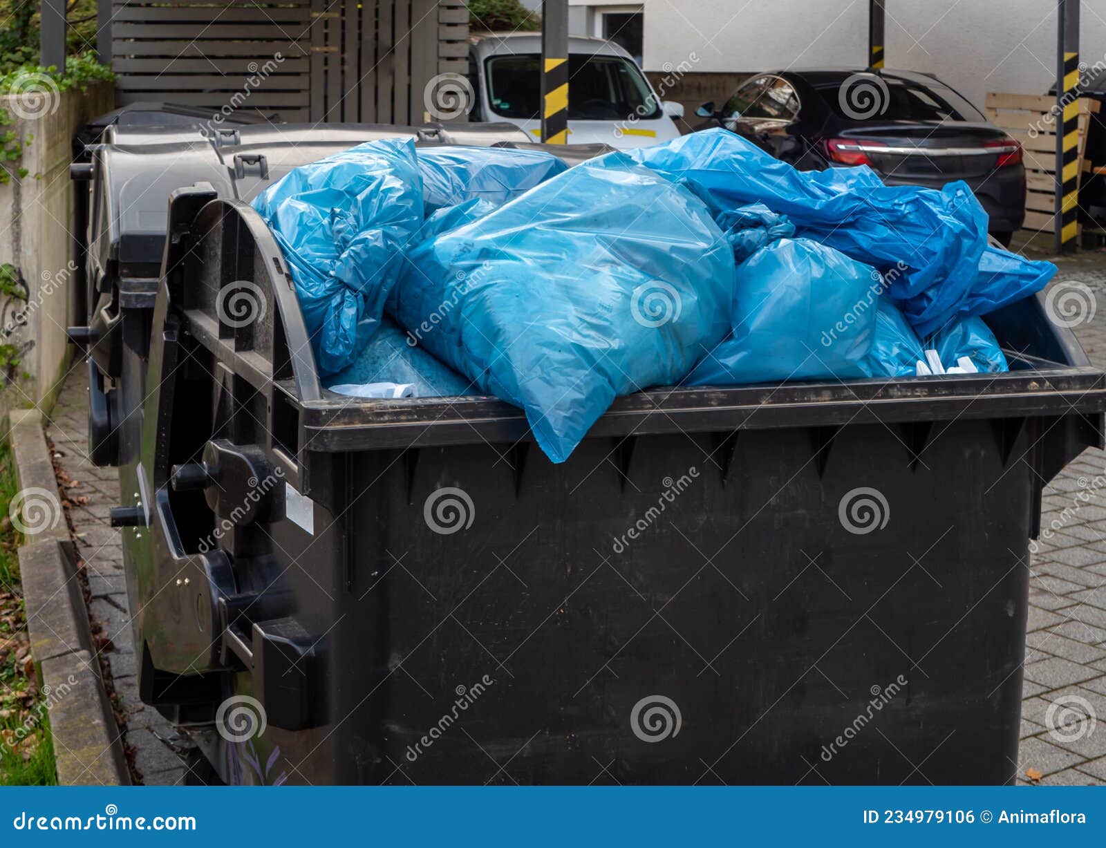 Garbage Can Full of Garbage Bags Stock Photo - Image of europa ...