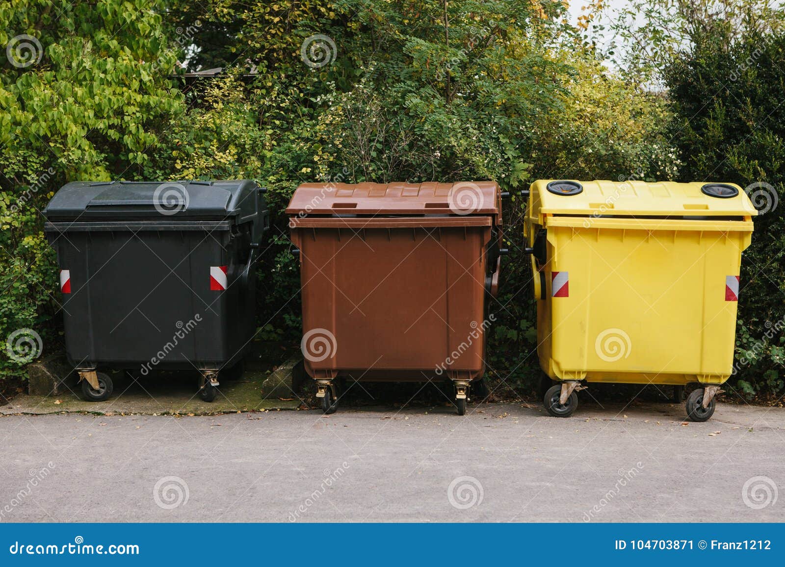 Garbage Cans in a Row. Separate Waste Collection. Stock Image - Image ...