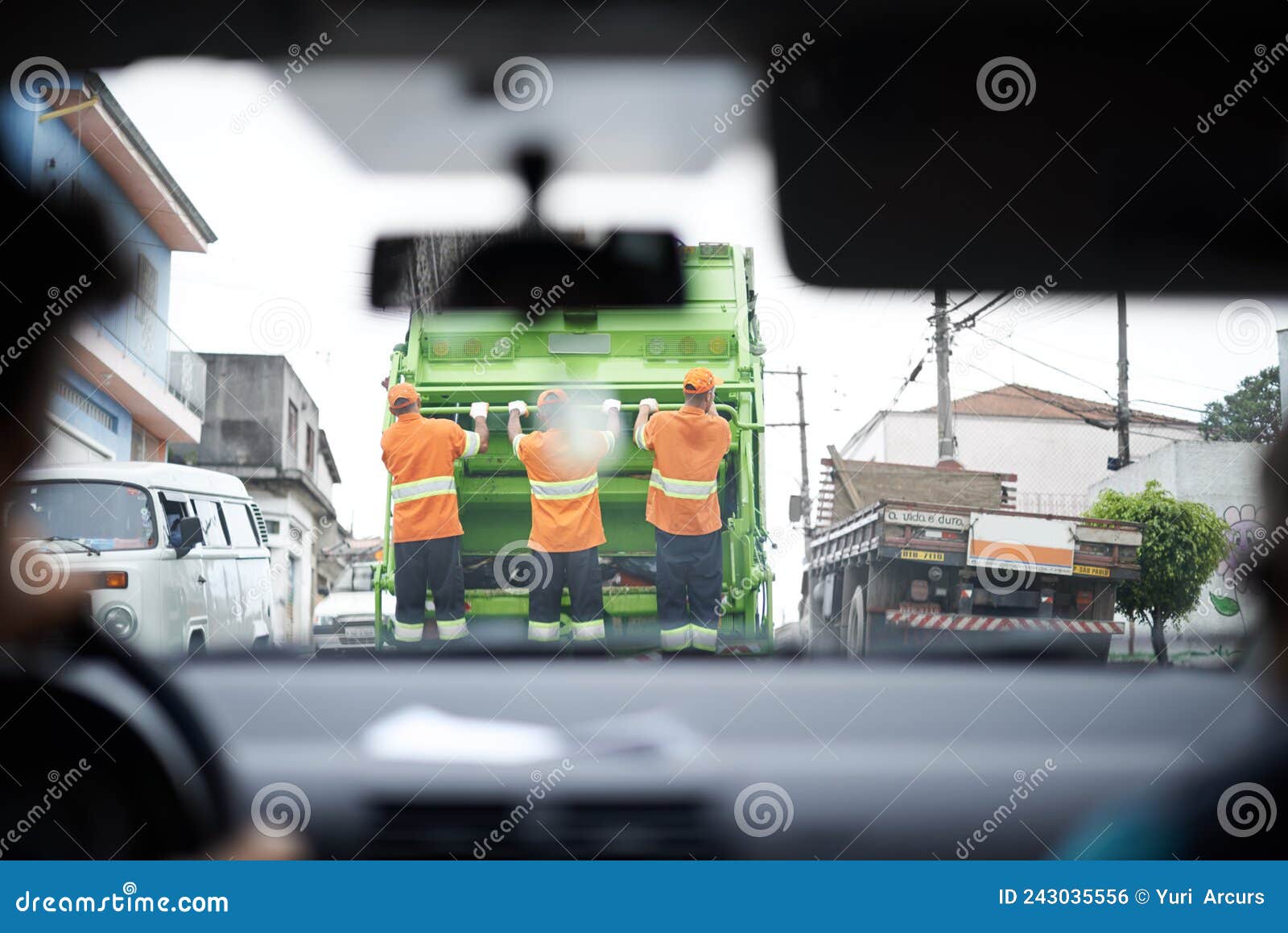 Garbage Collection Day. Cropped Rear View Shot of a Garbage Collection ...