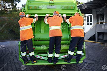 Garbage Collection Day. a Garbage Collection Team at Work. Stock Photo ...