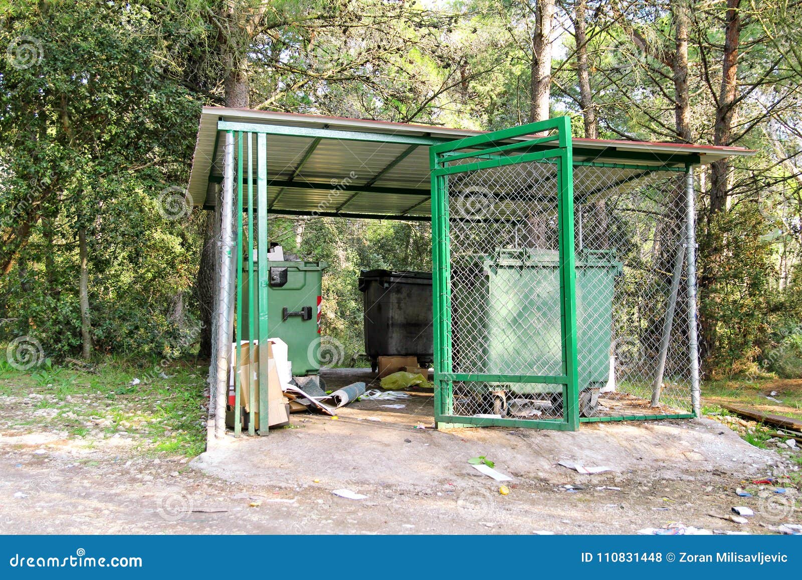 Garbage Containers in Fence Cage / Orderly Stowed Garbage Cans for ...