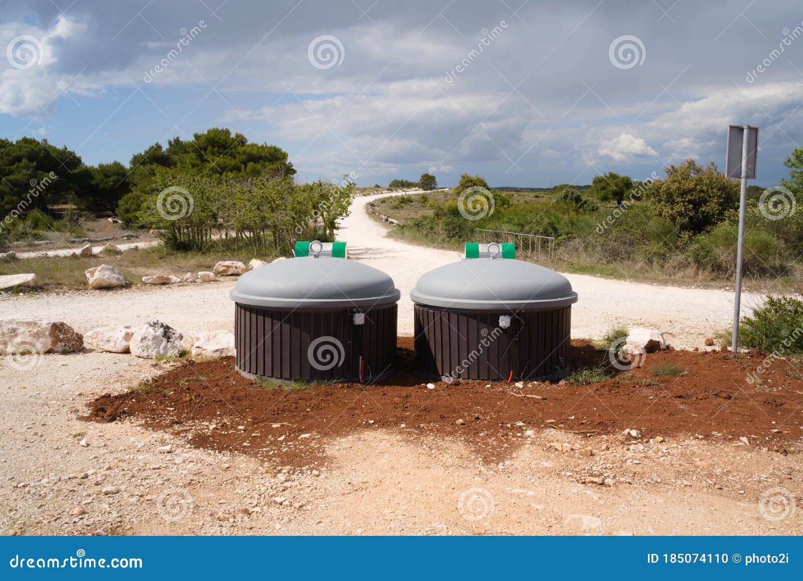 Garbage Containers in a Protected Landscape Stock Photo - Image of ...