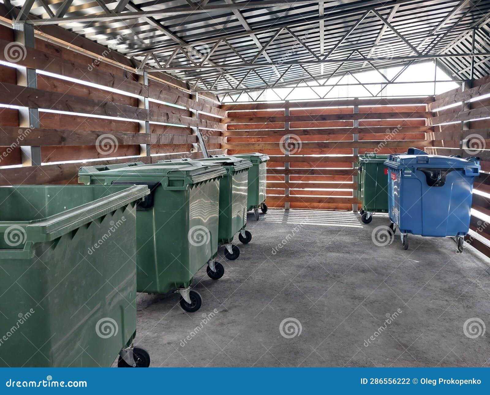 Garbage Containers in a Residential Area Stock Photo - Image of full ...