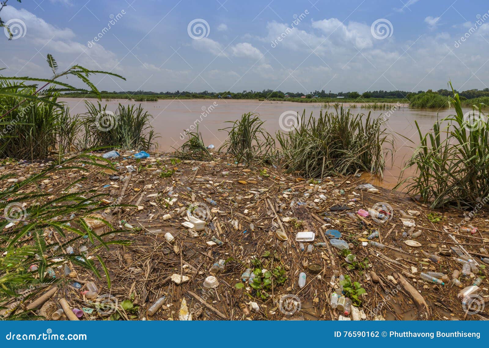 Garbage flooding in laos stock photo. Image of bottle - 76590162