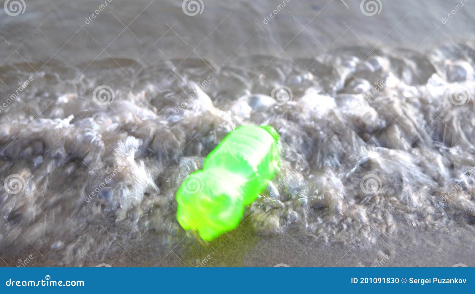 Garbage in the Form of a Plastic Bottle Floats in the River, Lake Close ...