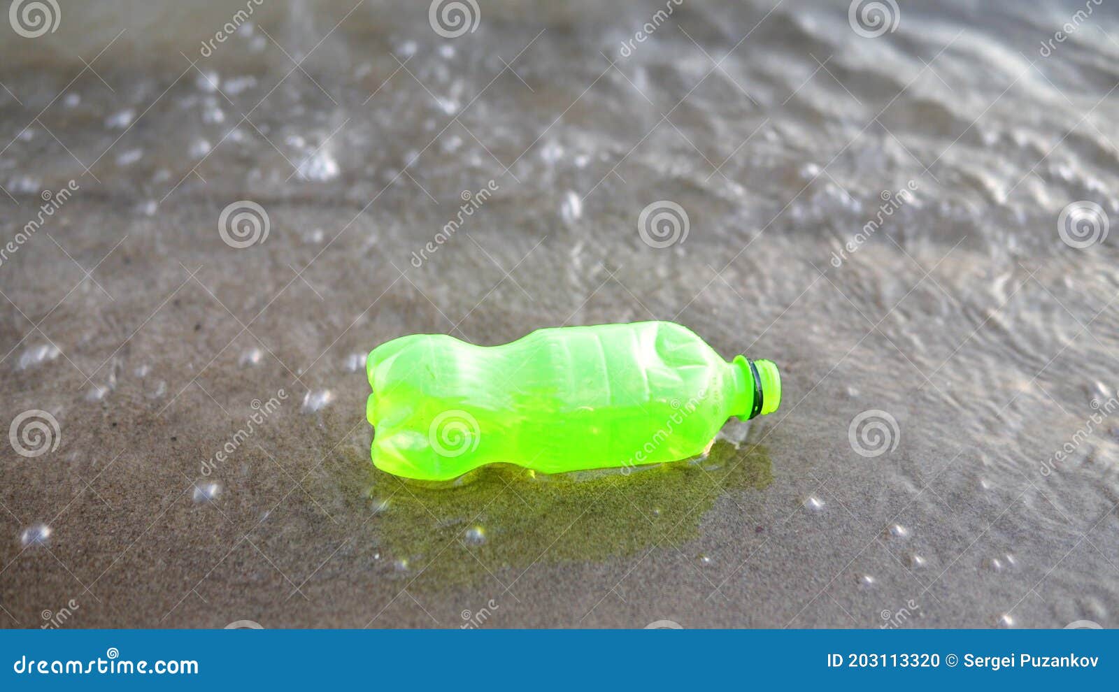 Garbage in the Form of a Plastic Bottle Floats in the River, Lake Close ...