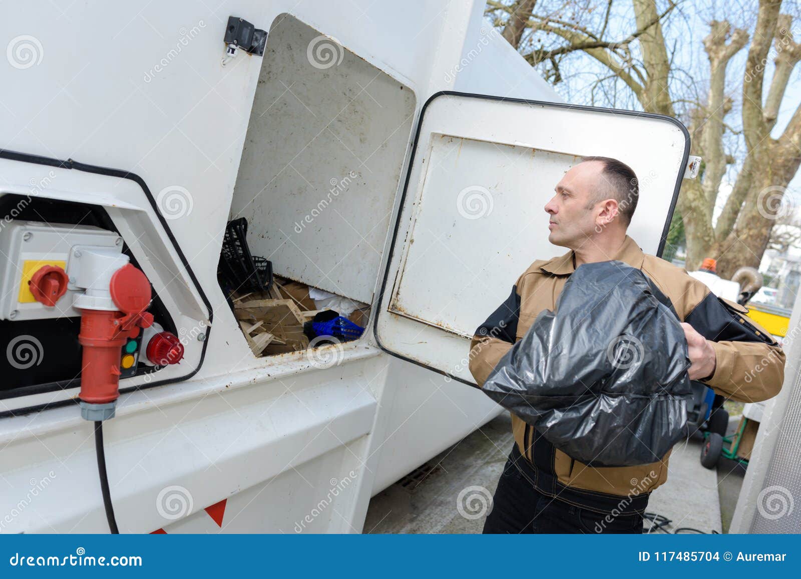A garbage man working stock photo. Image of resort, rubbish - 117485704