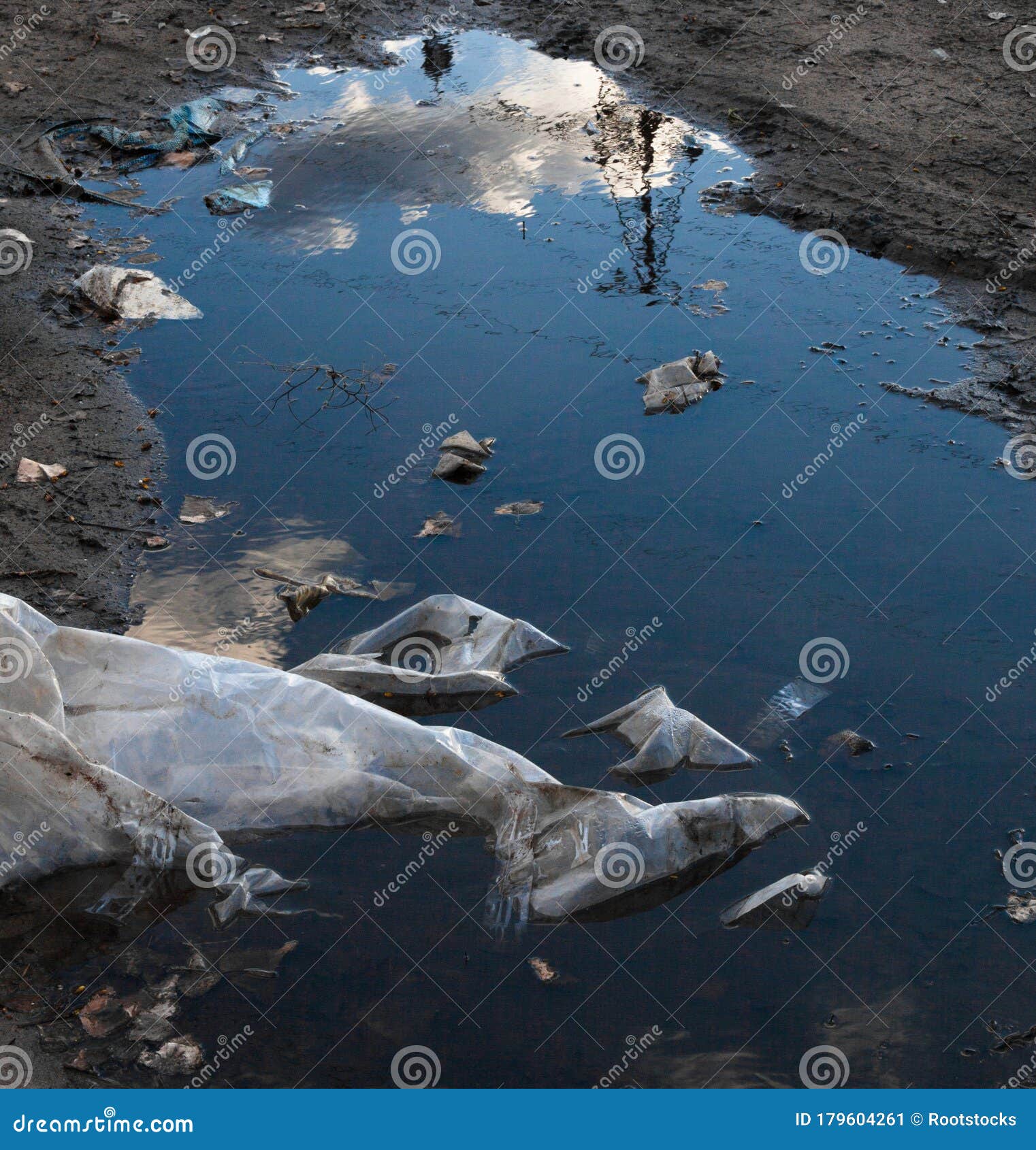 Garbage in the Mud on the Dirt Road Stock Image - Image of messy, pylon ...
