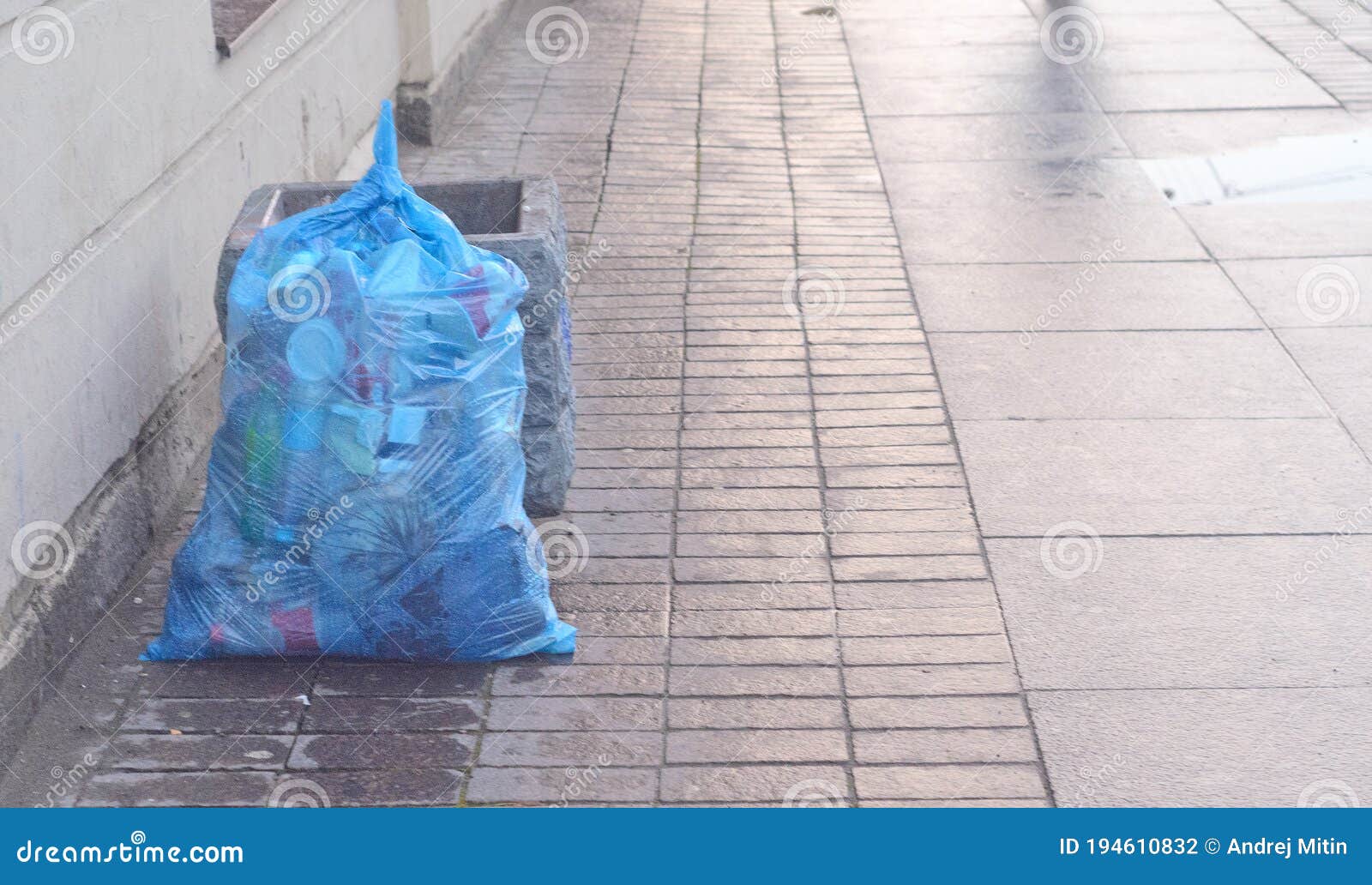 Garbage Pack on Pavement.Regular Garbage Collection in Urban City Stock ...