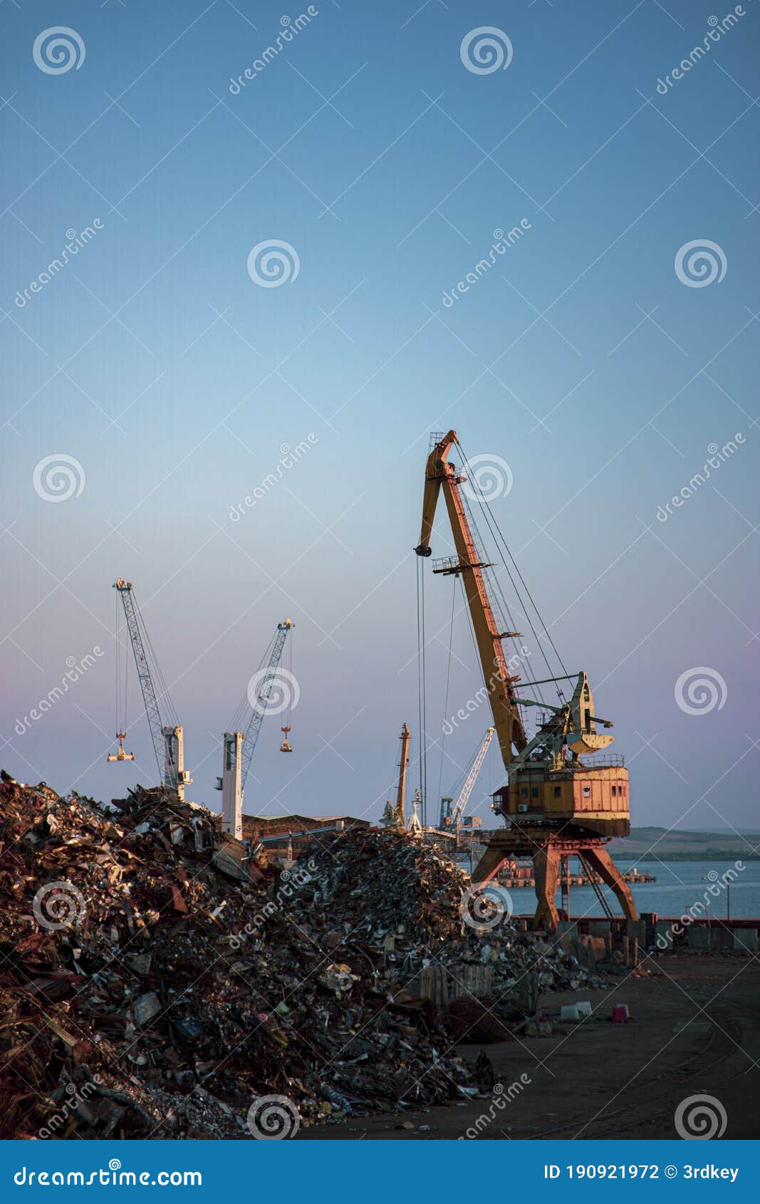 Garbage Pile in Trash Dump or Junkyard, Metal Crane Garbage Consumption ...