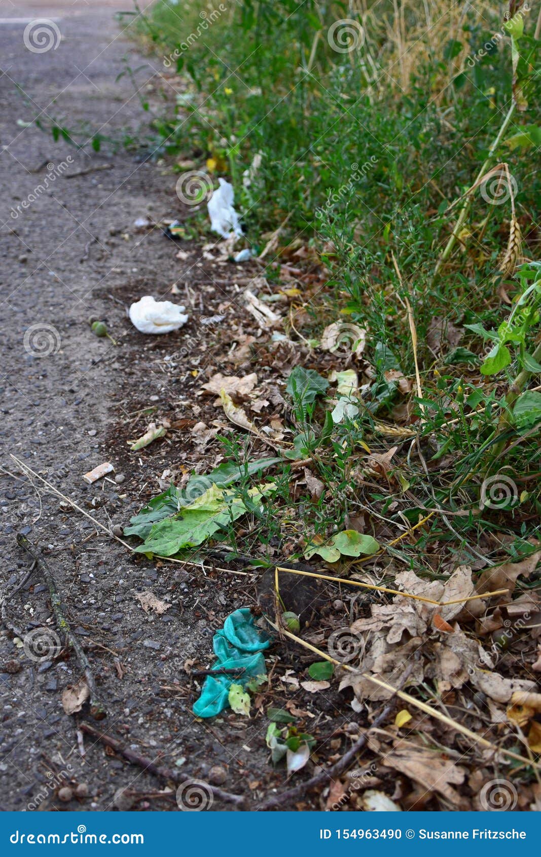Garbage on the roadside stock photo. Image of pollution - 154963490
