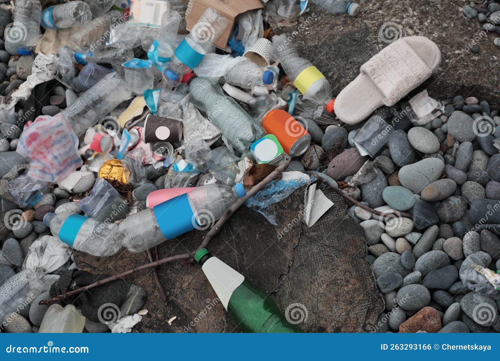 Garbage Scattered on Pebbles Outdoors, Top View. Recycling Problem ...