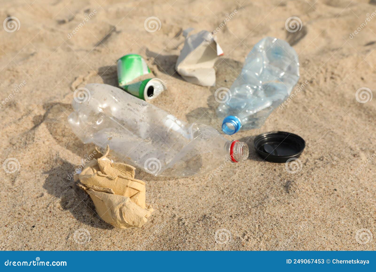 Garbage Scattered on Sand, Closeup. Recycling Problem Stock Image ...