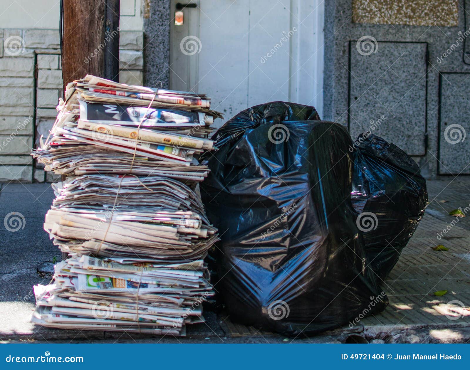 Garbage on the street stock photo. Image of newspaper - 49721404