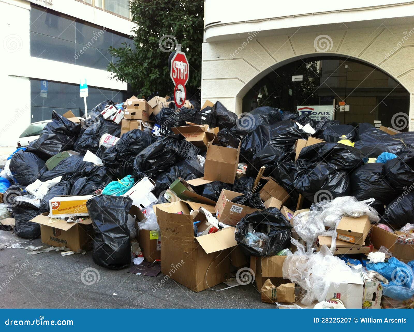 Pile Of Garbage Bags And Messy Trash On Street Sidewalk With Traffic On ...