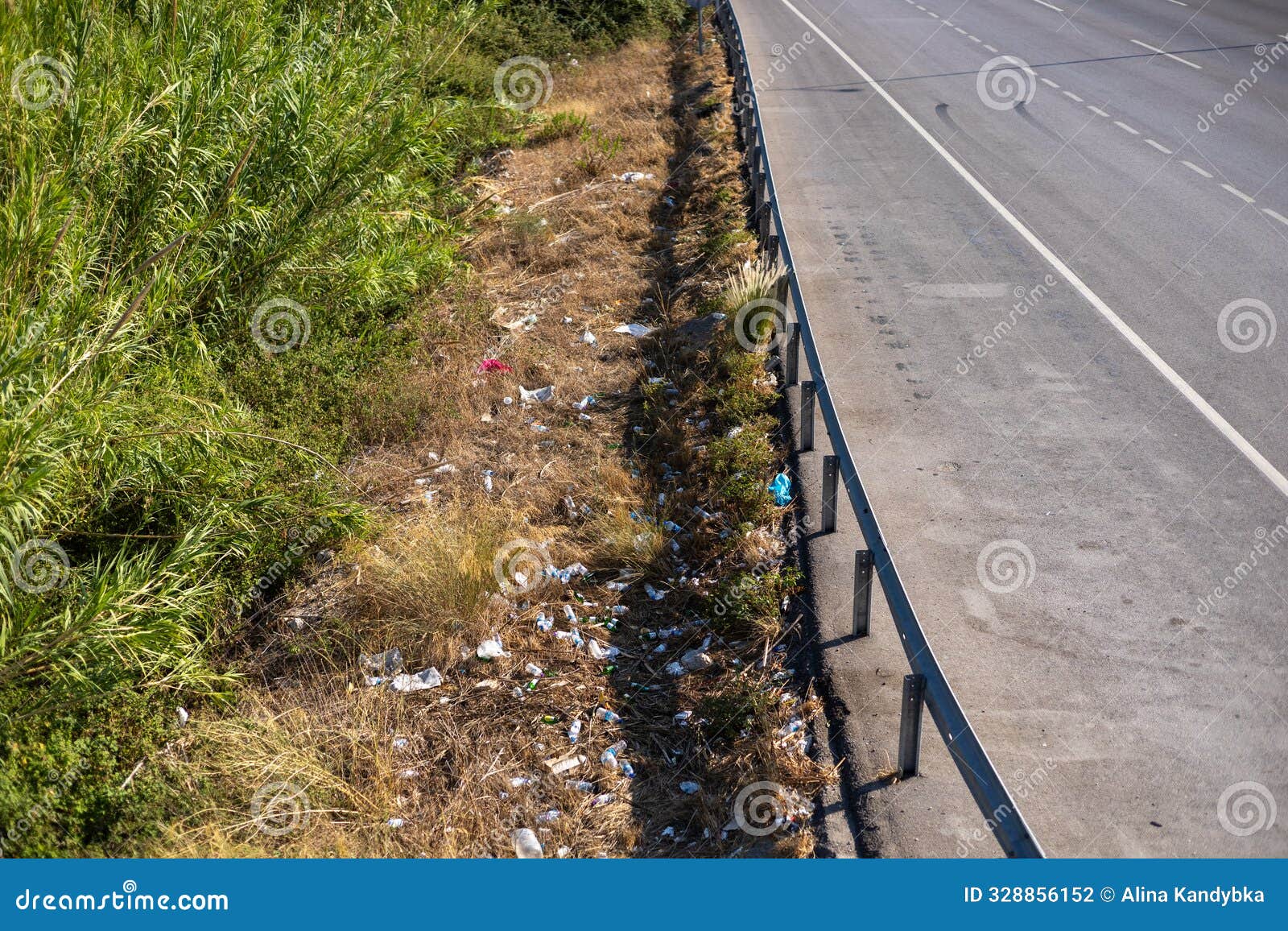 Garbage Thrown on the Side of the Highway. Stock Photo - Image of ...