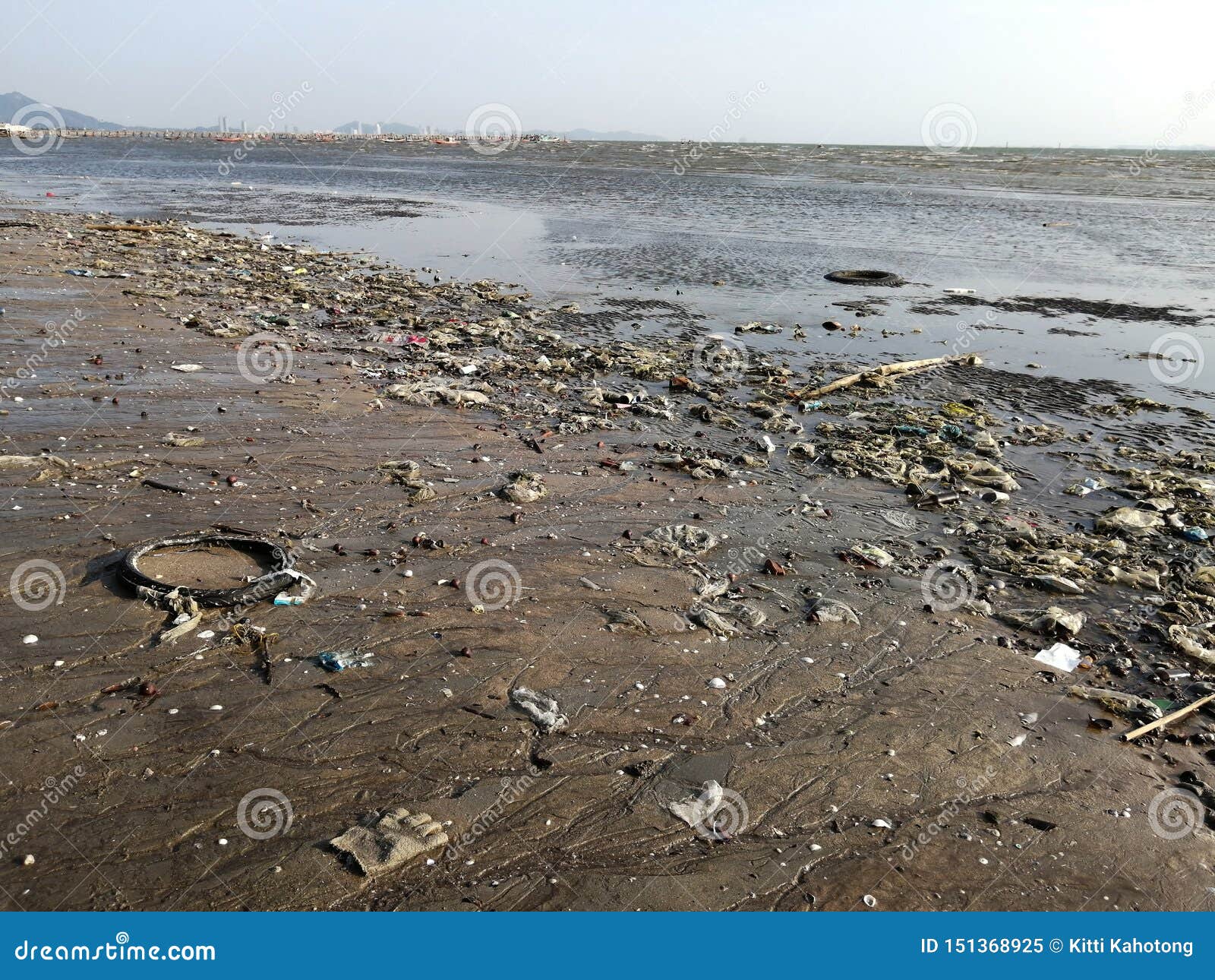 Garbage Trash on the beach stock image. Image of environmental - 151368925