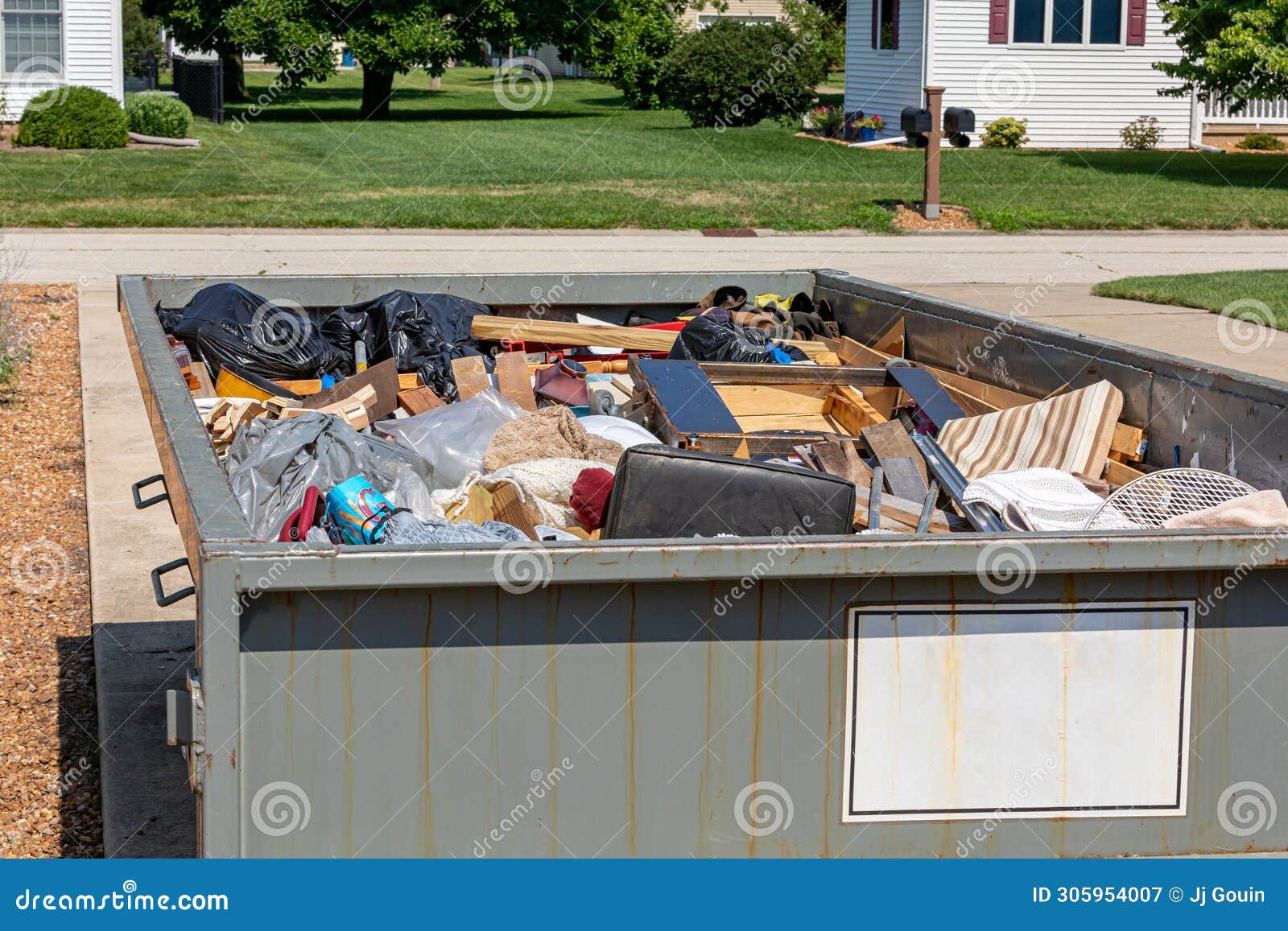 Garbage, Trash or Waste Dumpster Full of Household Junk. Stock Image ...
