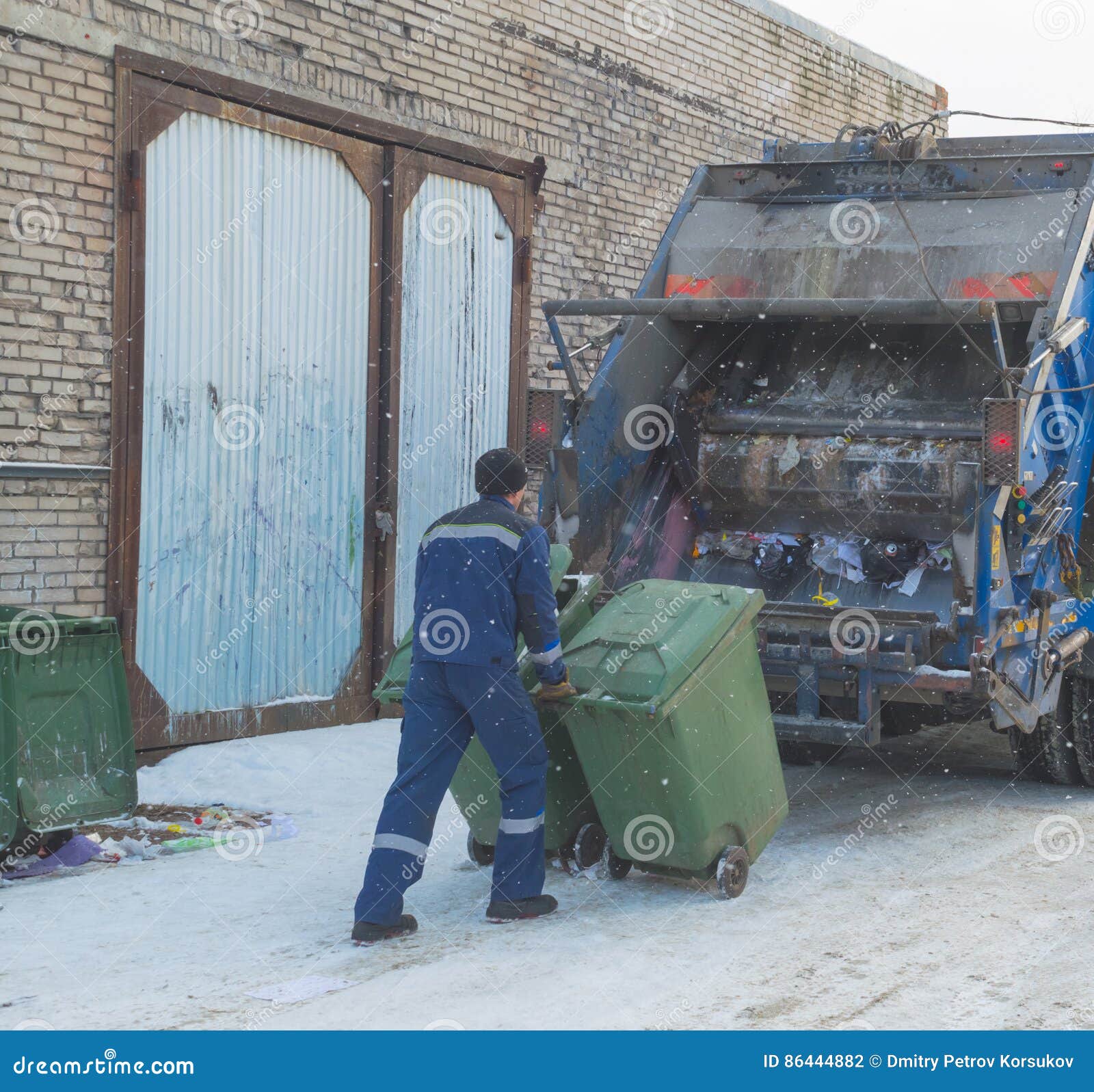 Of a Garbage Truck Worker Prepares Barrels of Garbage Editorial ...