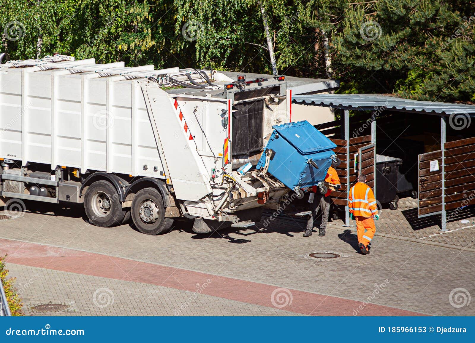 Garbage Truck and Workers Collecting Garbage. Stock Image - Image of ...