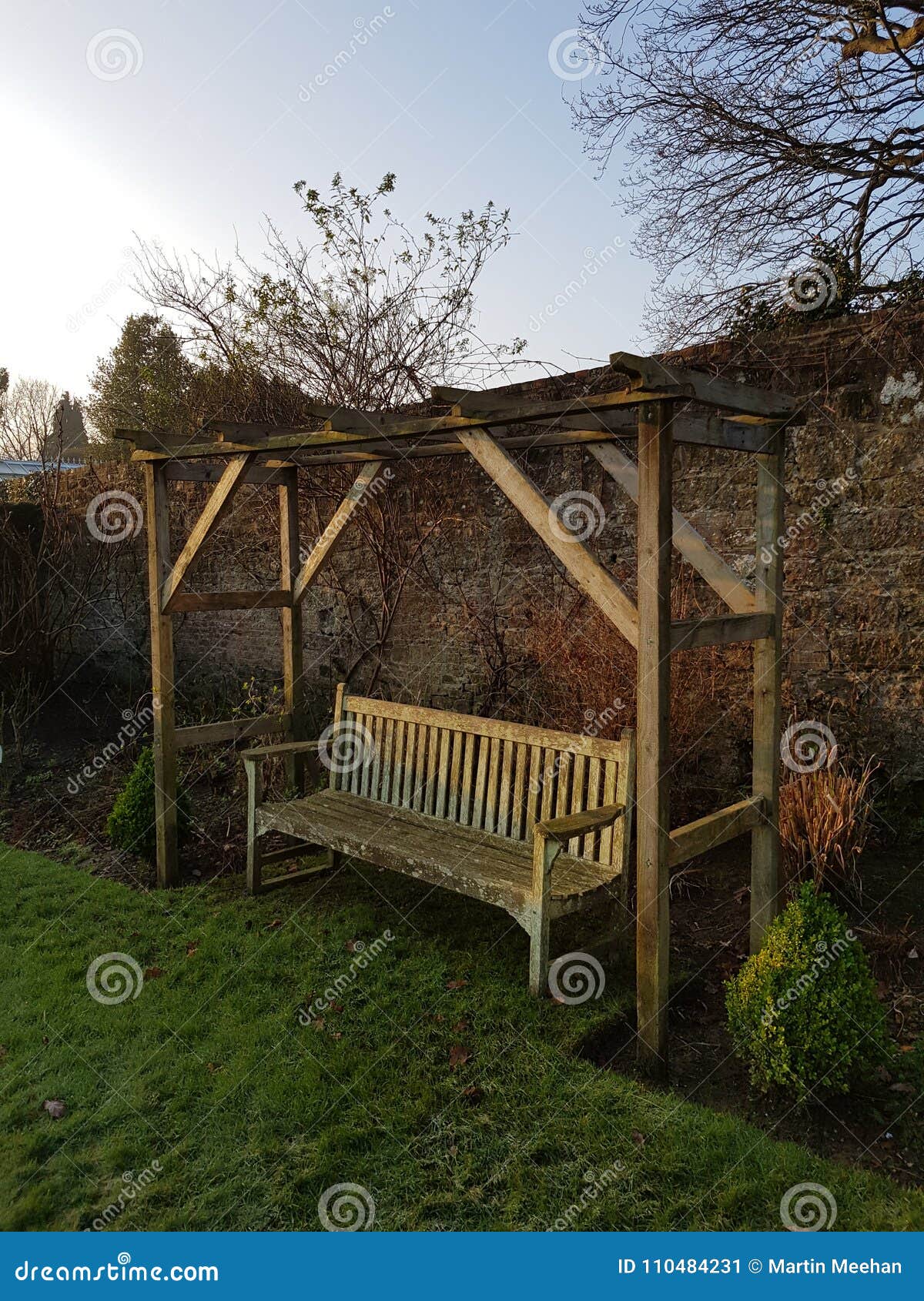 Garden arbor with bench. stock image. Image of park - 110484231