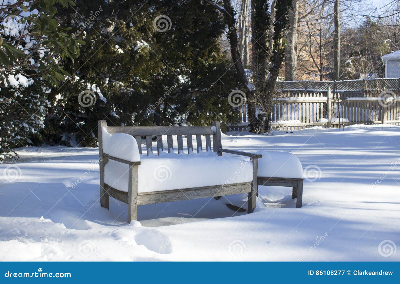 Garden bench in the snow stock image. Image of yard, fence - 86108277