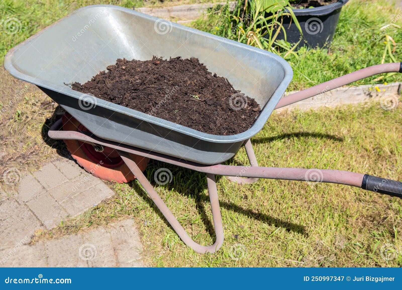 Garden Cart with Peat on the Lawn Stock Image - Image of landscaping ...