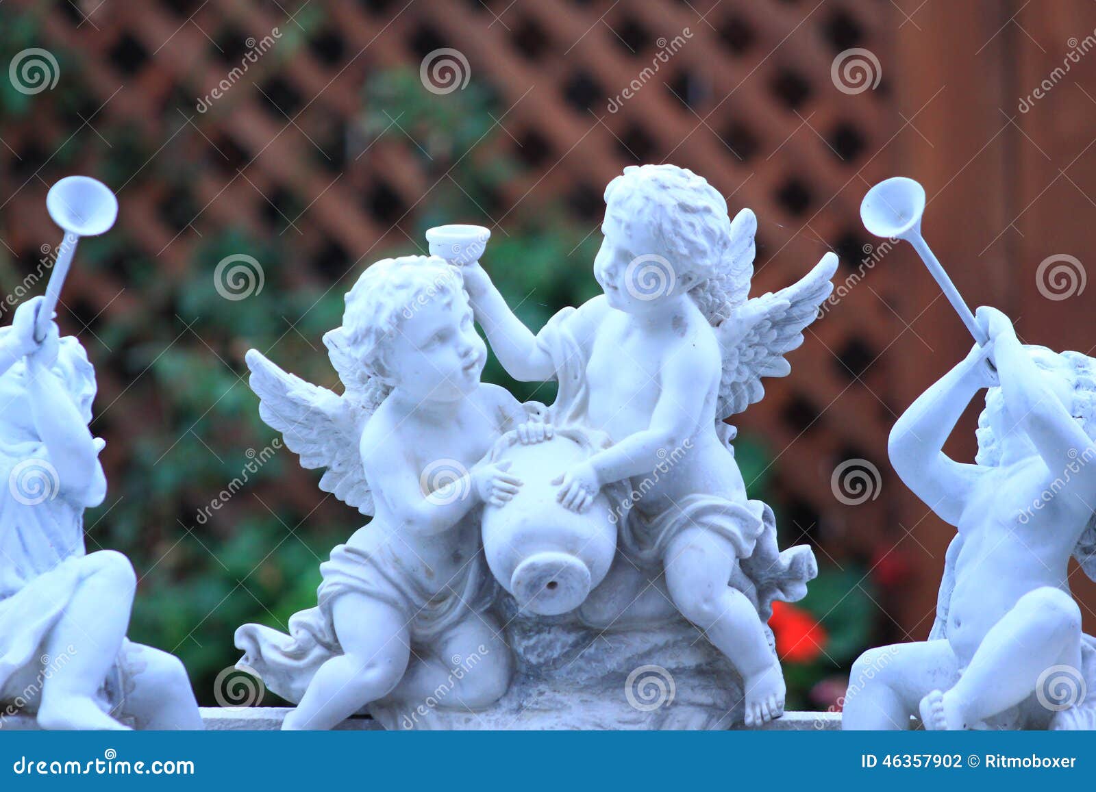 Garden Cherubs in an Outdoor Landscape Stock Photo - Image of playful ...
