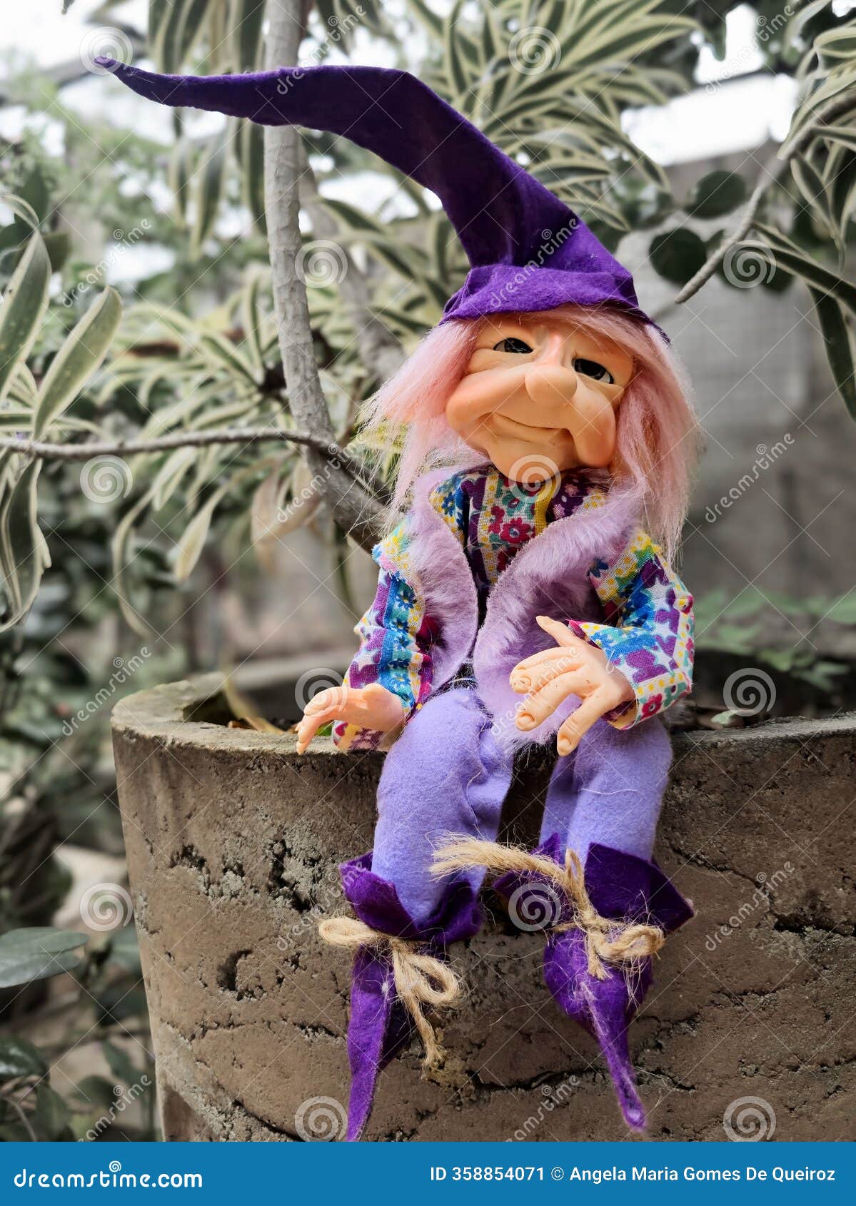 Garden Elf Sitting in Cement Jug in the Garden. Stock Image - Image of ...