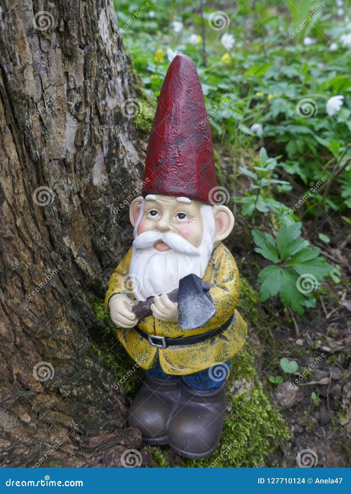 Garden Gnome in the forest stock photo. Image of forest - 127710124