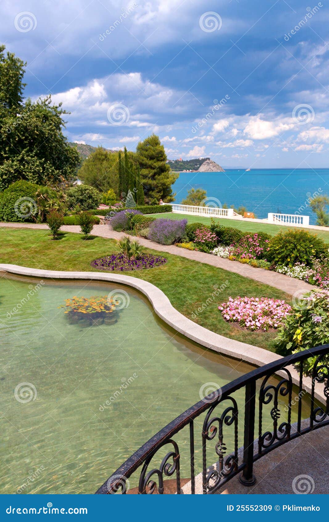 Garden with pond near sea stock image. Image of lawn - 25552309