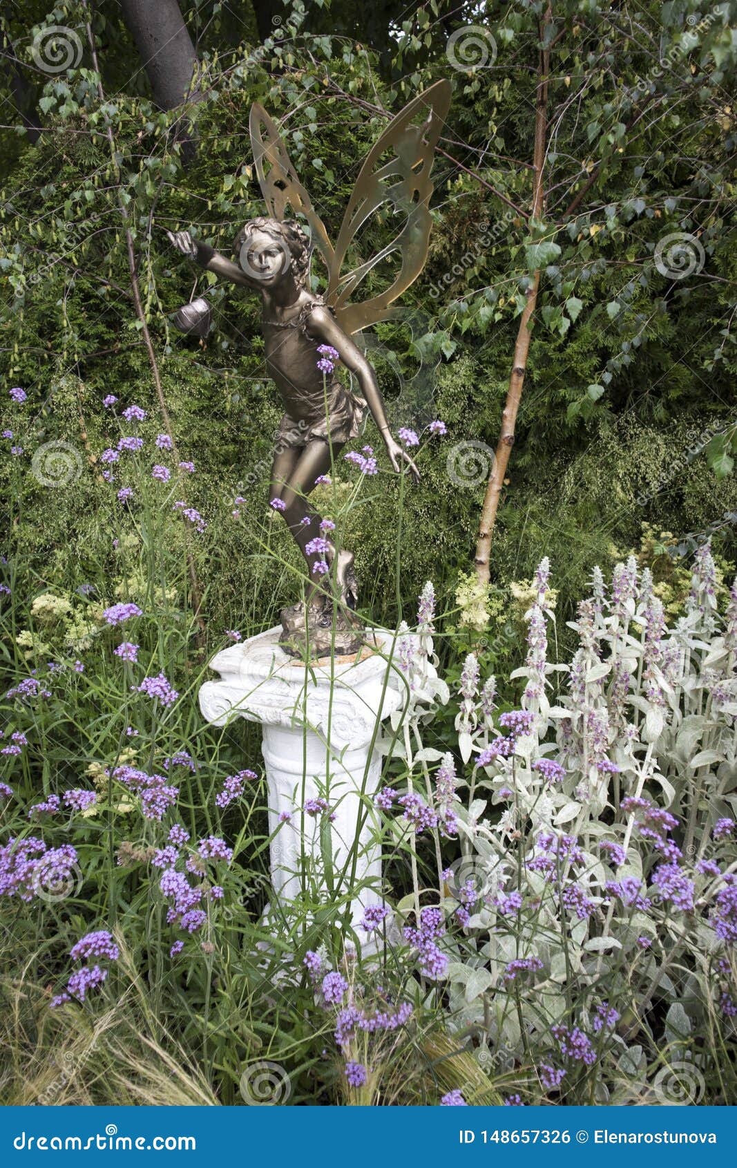 Garden Sculpture in the Garden in Form of Fairies with Wings among the ...