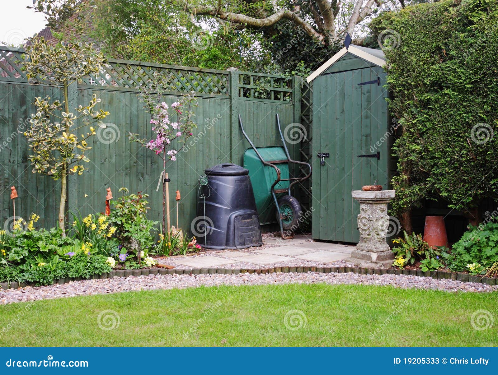 Garden Shed in an English Garden with Compost Bin Stock Image - Image ...